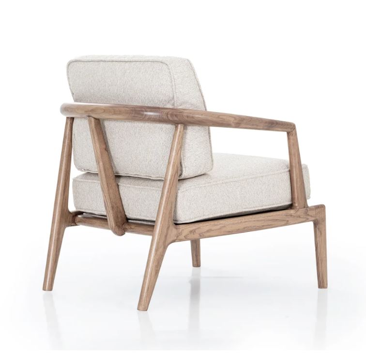 lounge chair made of solid teak wood with covered in foam and upholstery